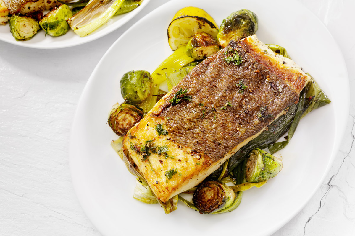 Crispy Skinned Cod with Sautéed Leeks, Sprouts and Lemon | Seafood By Sykes